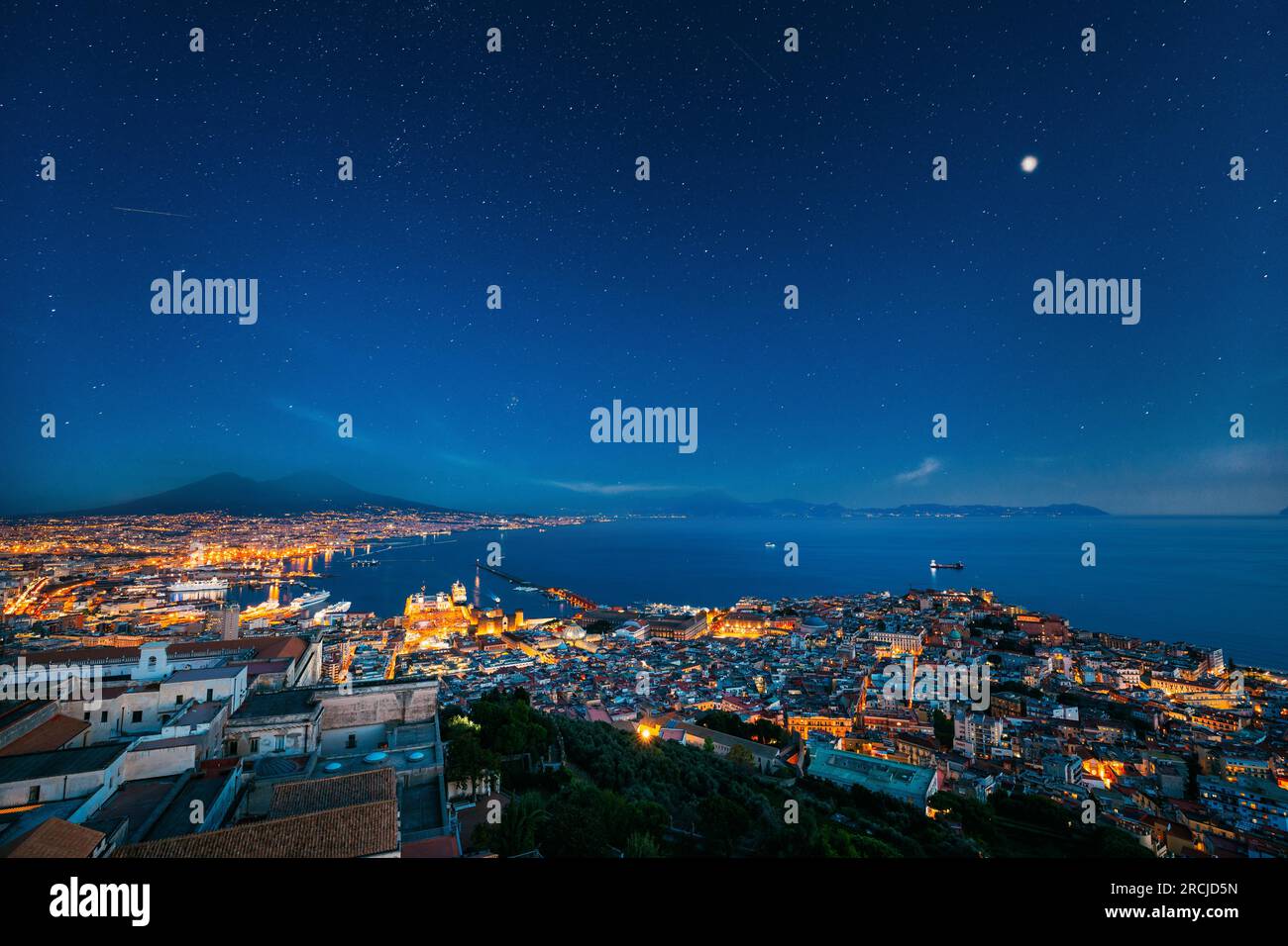 Naples, Italy. Skyline Cityscape In Evening Lighting. Tyrrhenian Sea ...