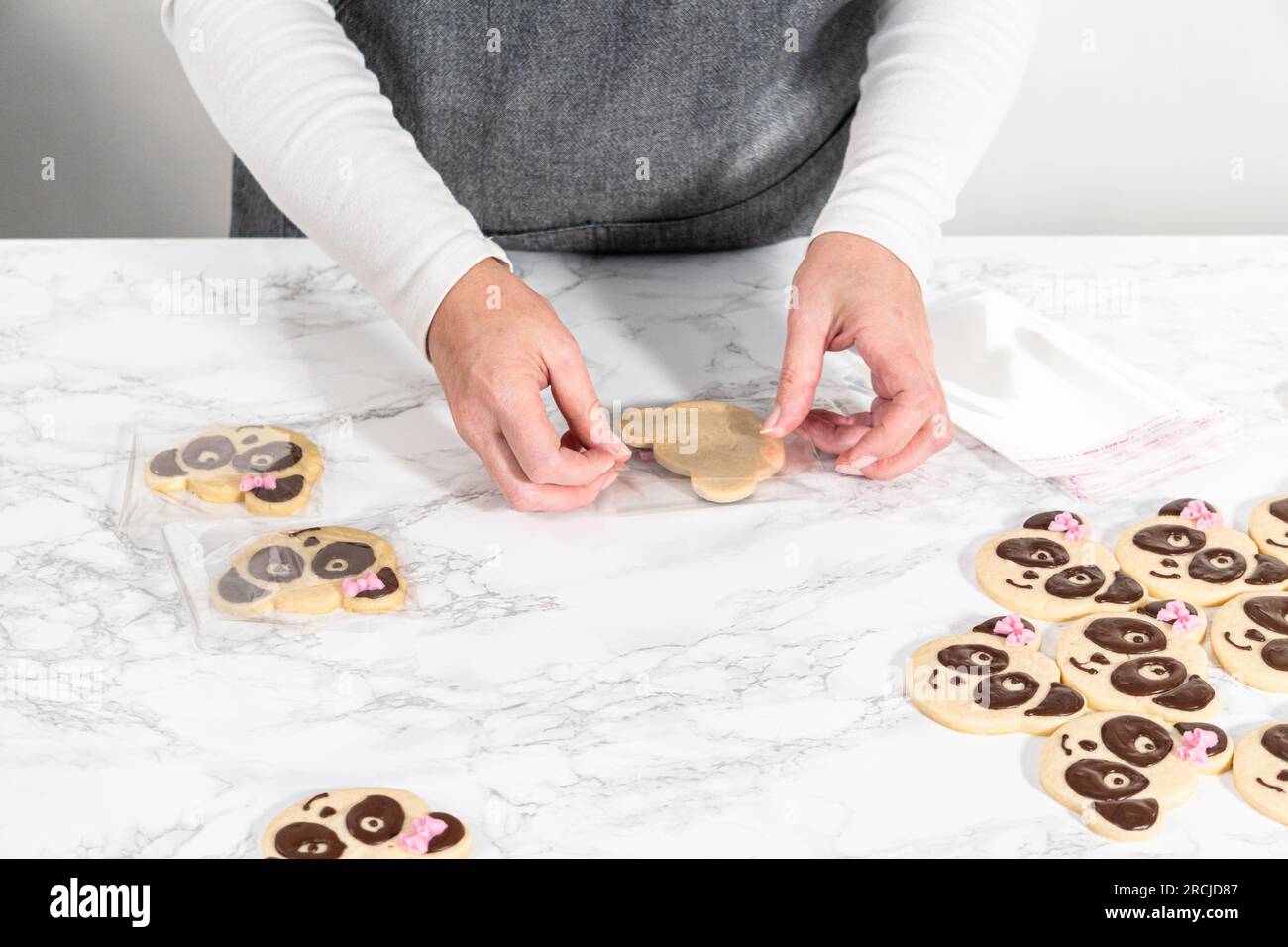 Panda shaped shortbread cookies with chocolate icing Stock Photo - Alamy