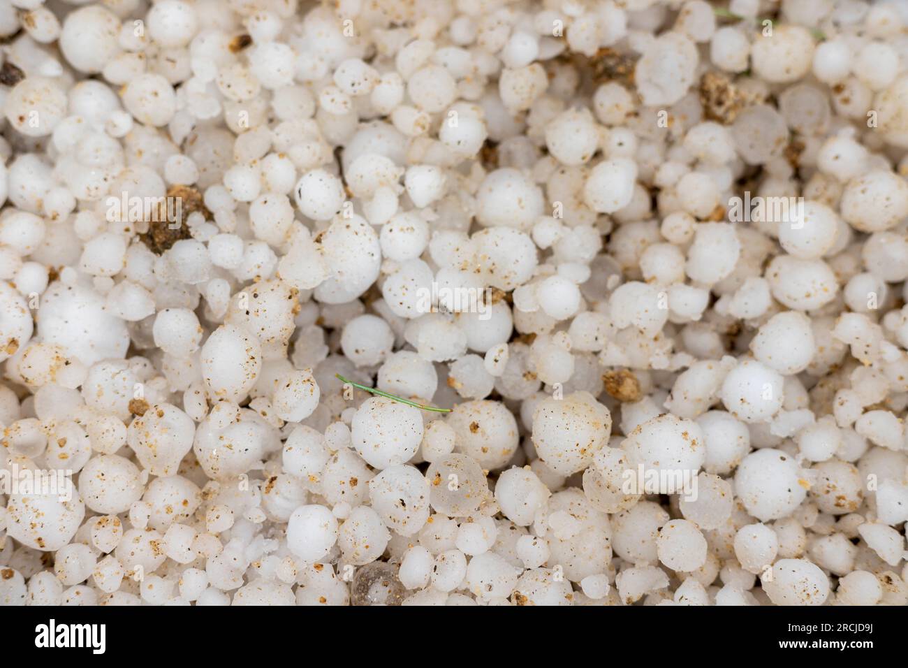 Heap of hail balls, Top view closeup Stock Photo - Alamy