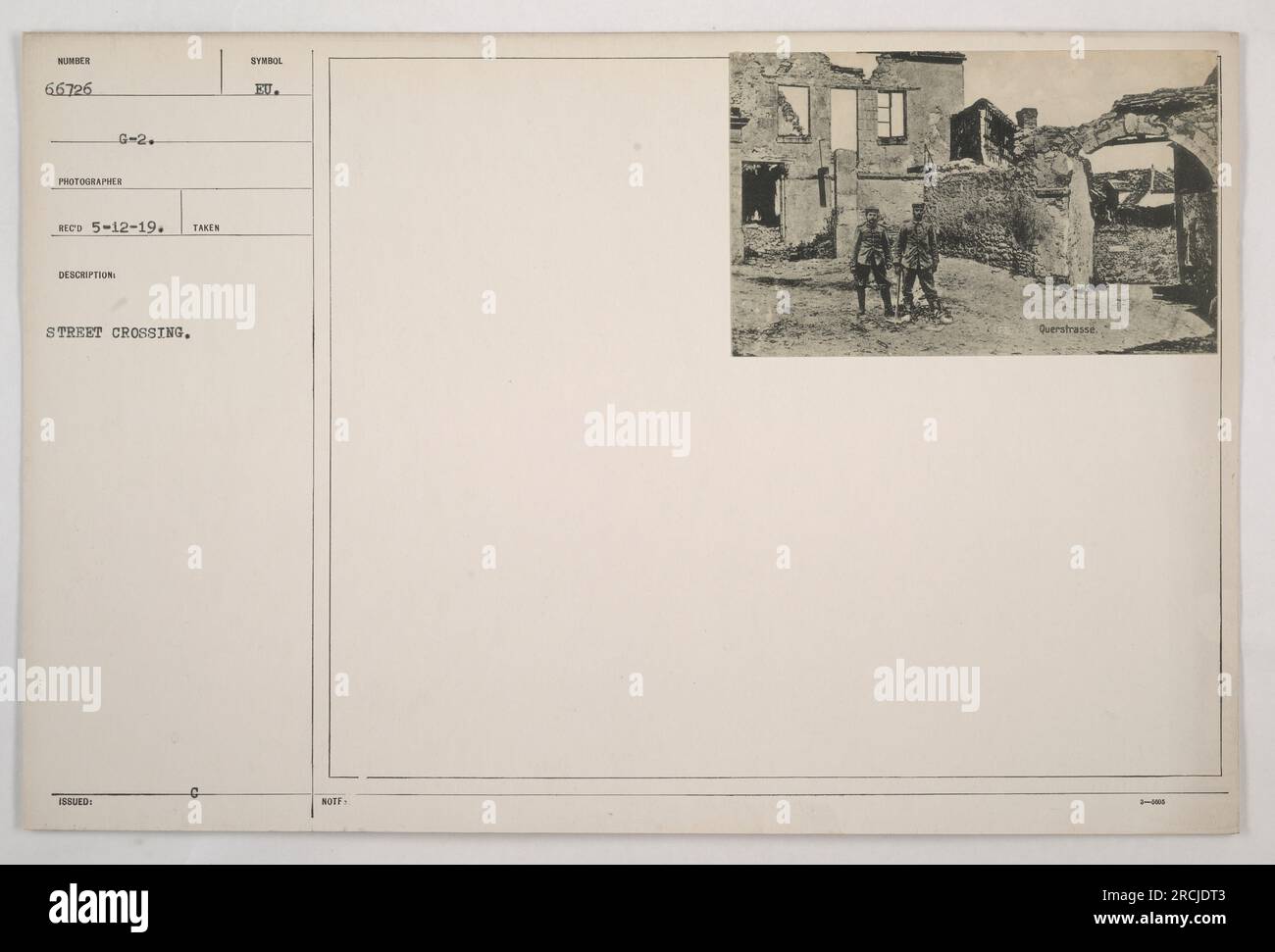 American soldiers crossing a street in in a city during World War One ...