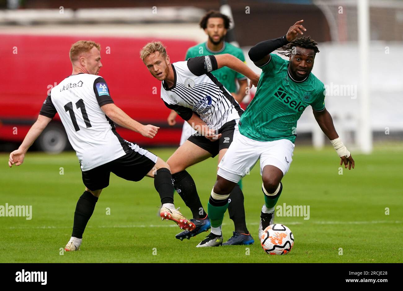 Gateshead's Adam Campbell (left) and Greg Olley (centre) battle with ...