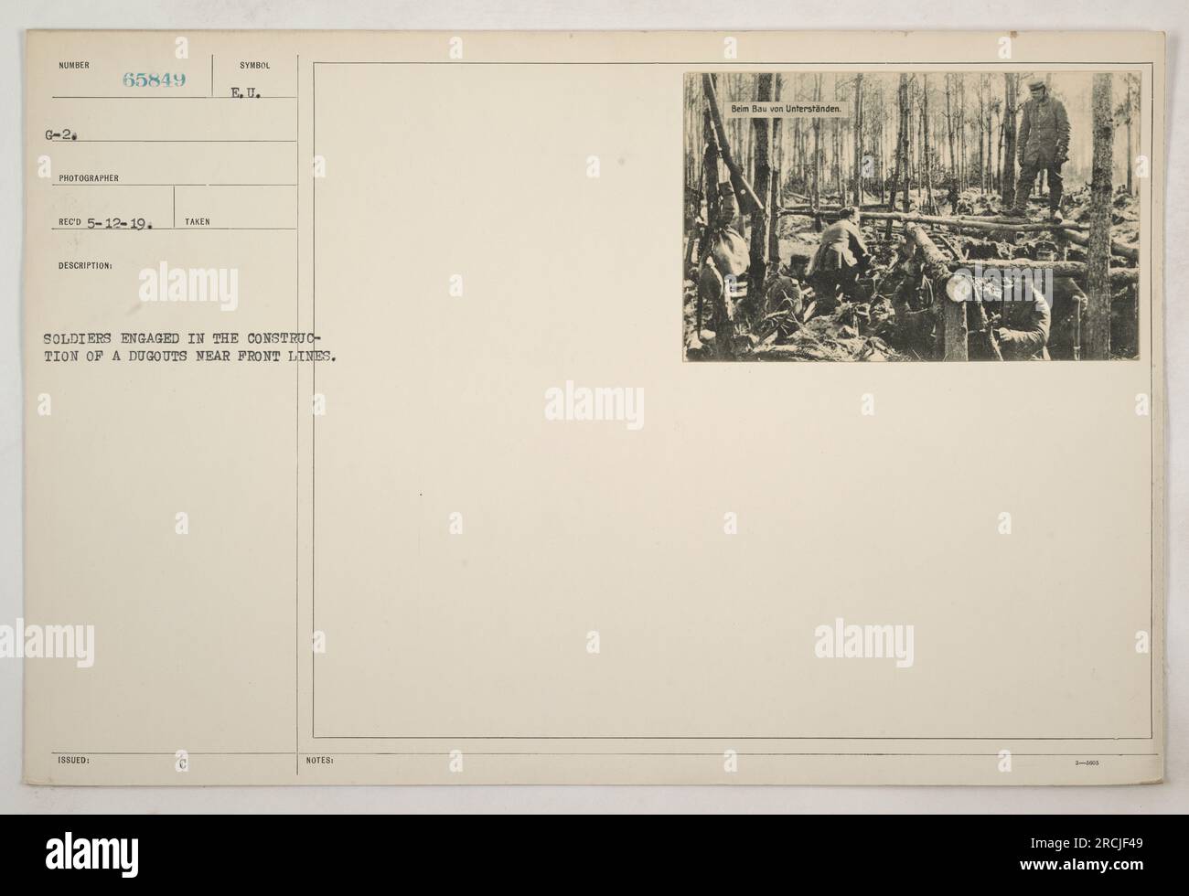 Soldiers are seen busy constructing a dugout near the front lines in ...