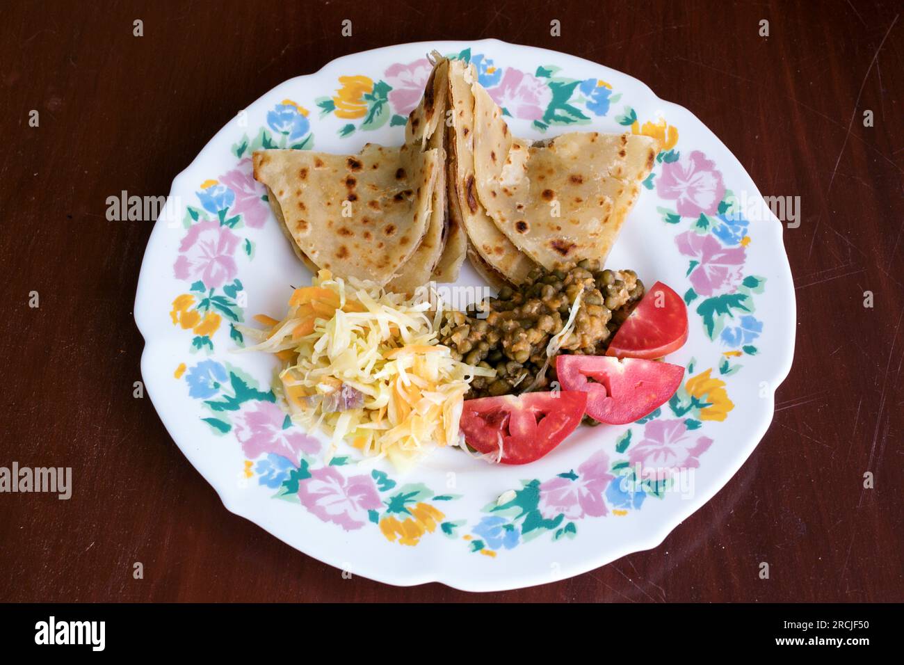 Kenyan cuisine includes ugali, chapati, githeri, goat, Nyama Choma ...