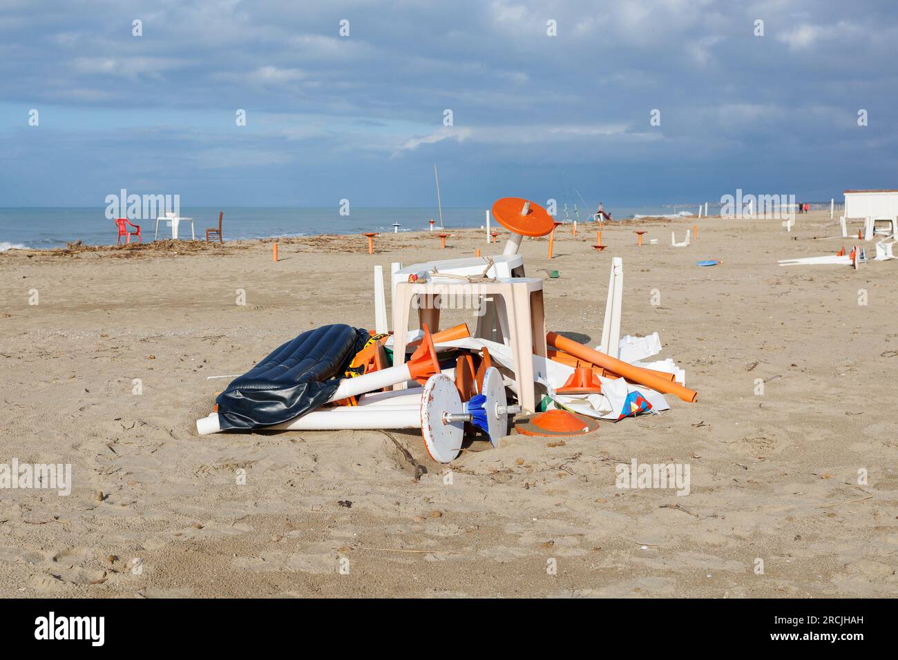 Deserted and Desolate Beach in Winter Time - Umbrella Poles, Tables ...