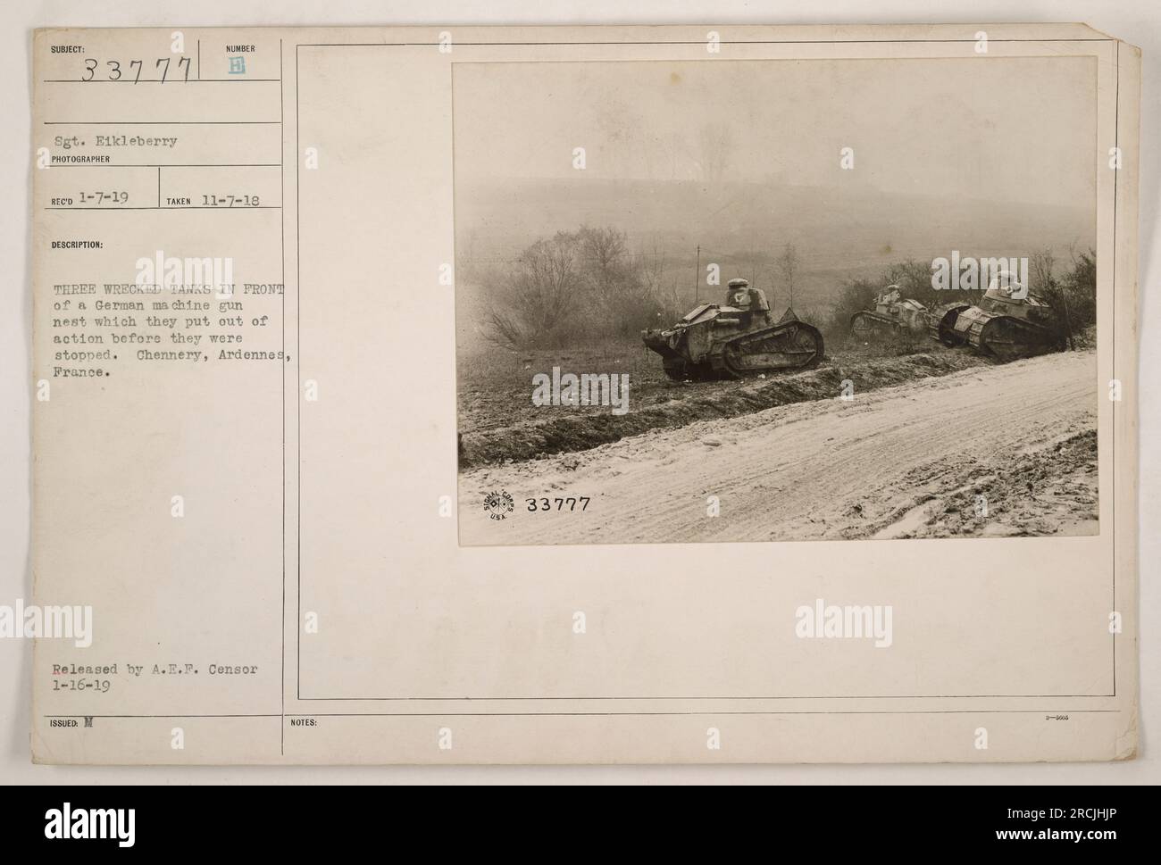 Three wrecked tanks are seen in front of a German machine gun nest ...