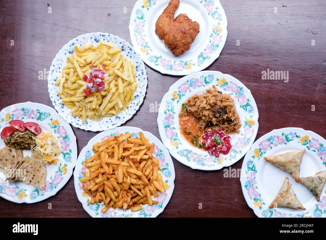 Kenyan cuisine includes ugali, chapati, githeri, goat, Nyama Choma ...