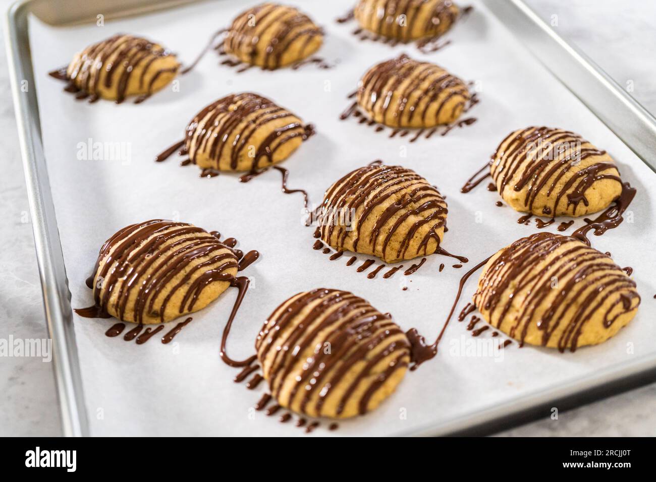 Banana cookies with chocolate drizzle Stock Photo - Alamy