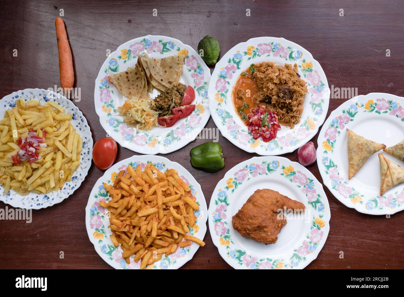 Kenyan cuisine includes ugali, chapati, githeri, goat, Nyama Choma ...