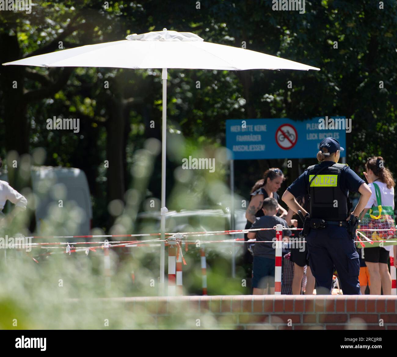 Berlin, Germany. 15th July, 2023. A police officer watches the arriving ...