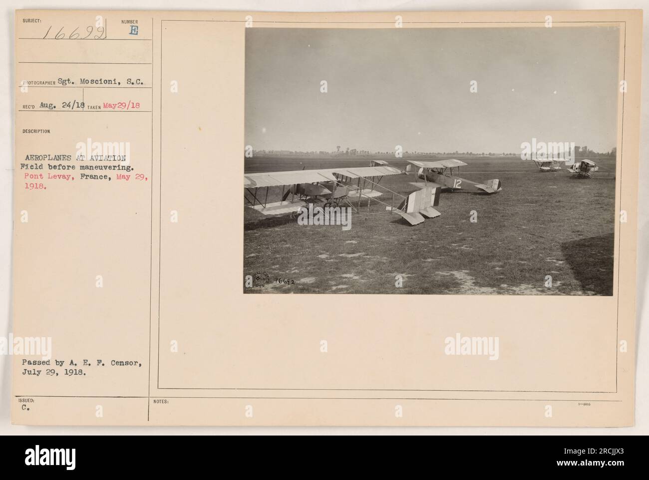 Aerial view of a collection of airplanes parked on the aviation field ...