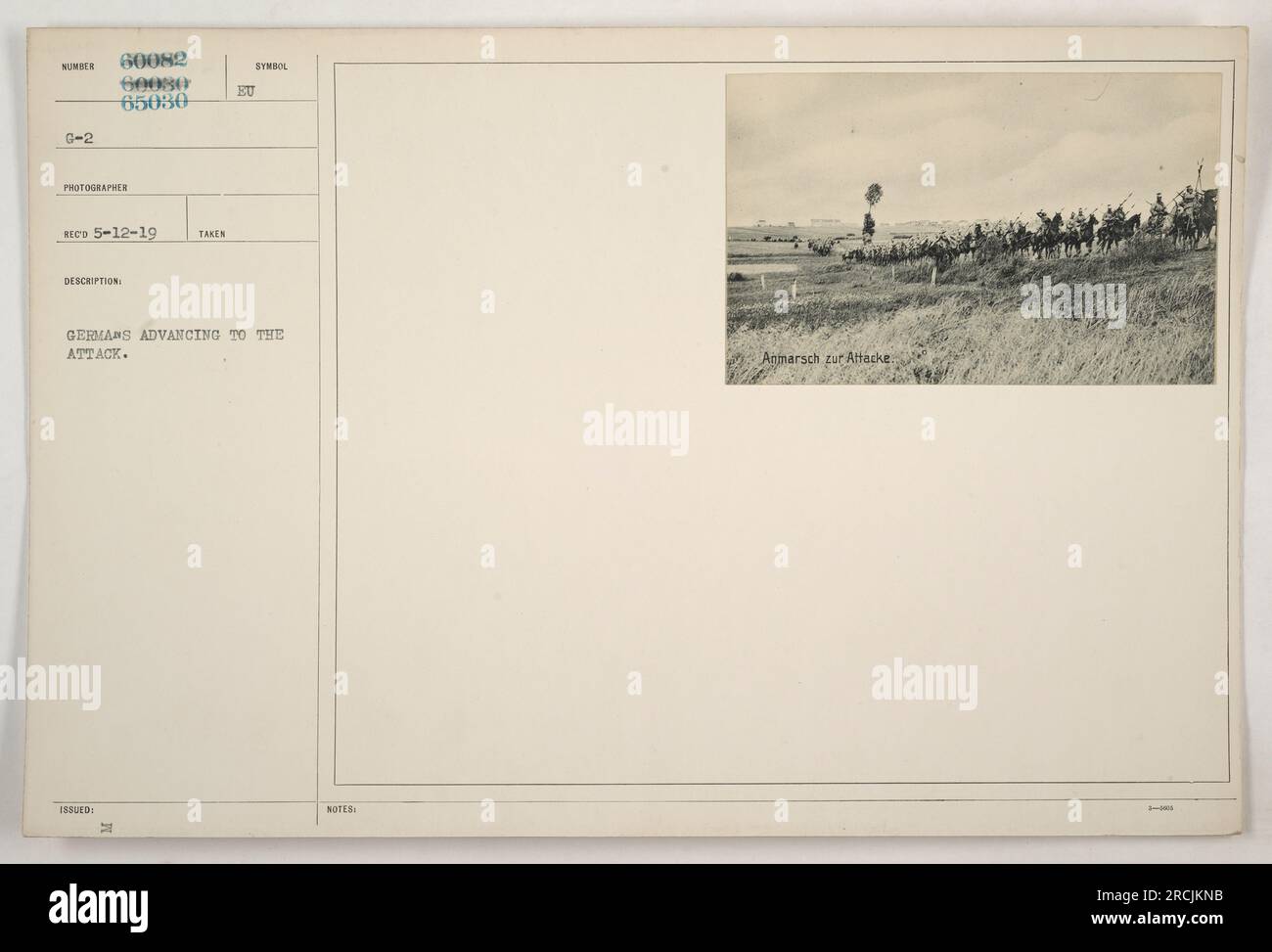 German soldiers advancing to launch an attack during World War I. The ...