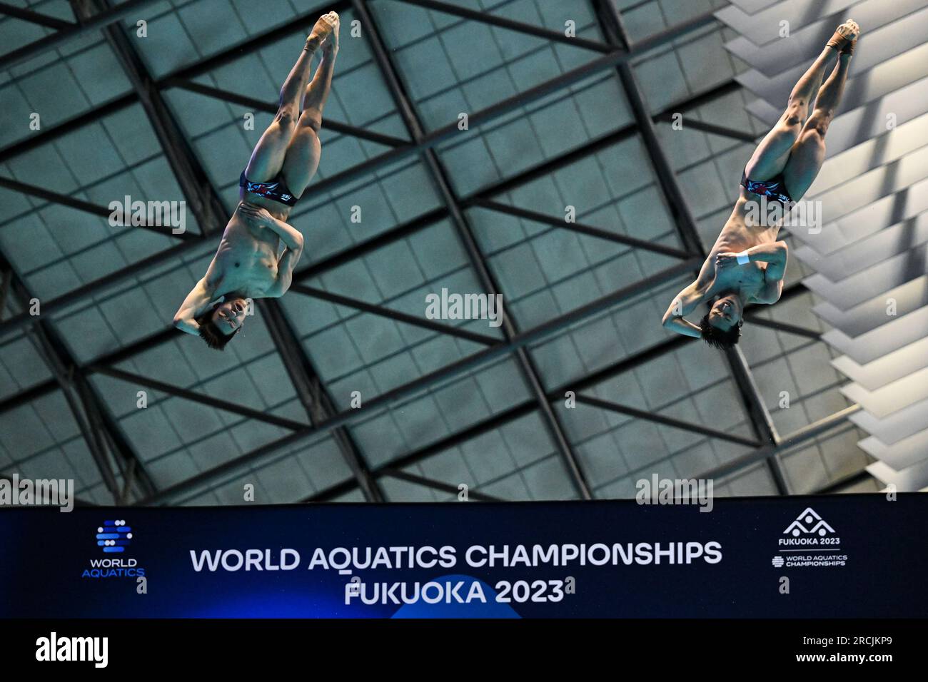 Fukuoka, Japan. 15th July, 2023. Long Daoyi/Wang Zongyuan (R) of China ...