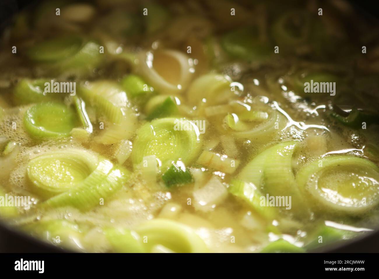 Leak and potato soup in a brown dish Stock Photo - Alamy