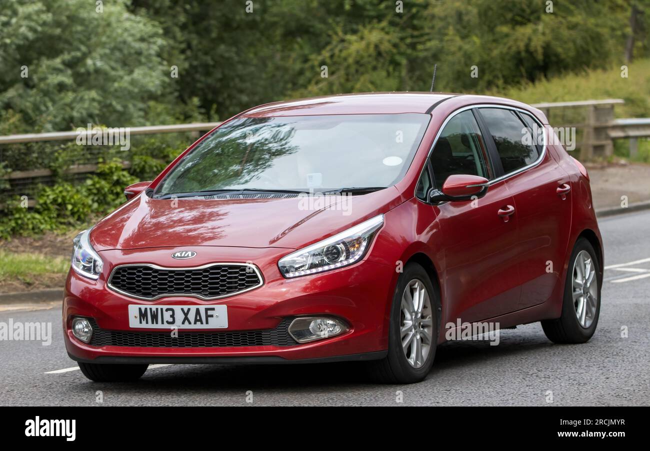 Milton Keynes, UK - July 13th 2023: 2013 red diesel engine KIA CEED car ...