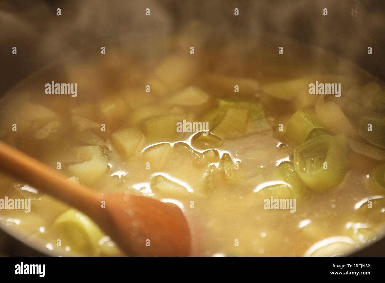 Leak and potato soup in a brown dish Stock Photo - Alamy