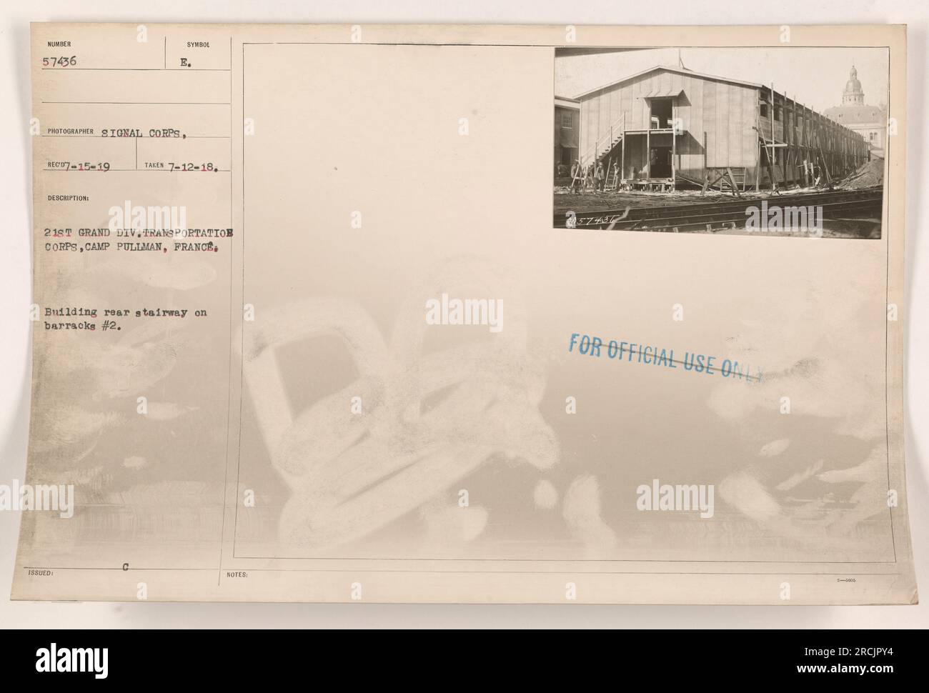 Construction workers building a rear stairway to barracks #2 at the ...