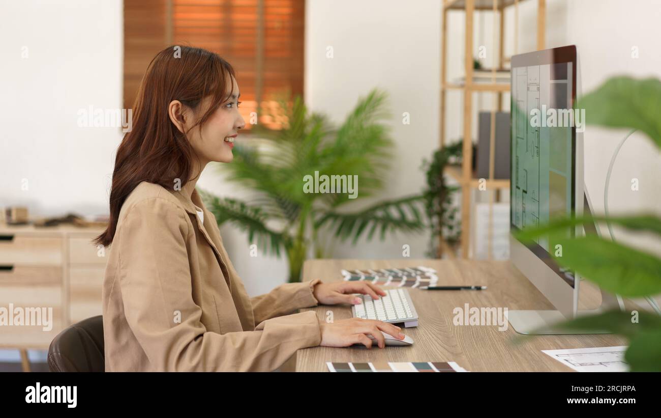 Architecture concept, Female architect working about designing house ...