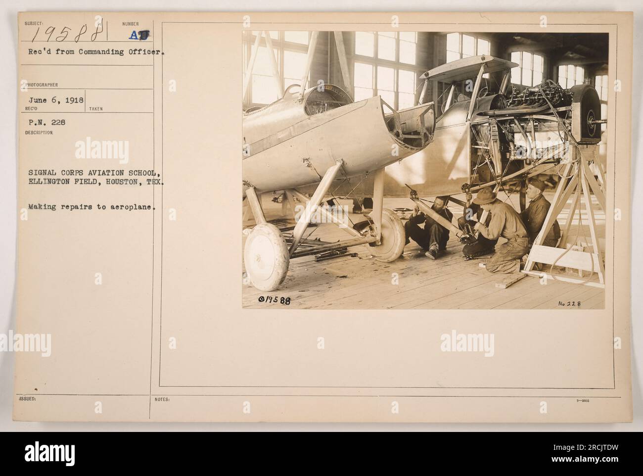 Soldiers conducting repairs on an airplane at Signal Corps Aviation ...