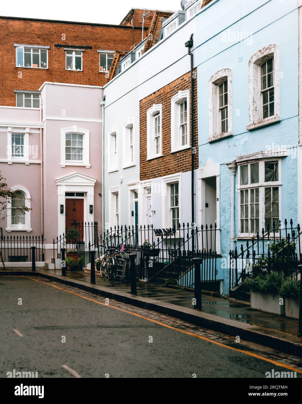 Corner houses in London on a rainy day Stock Photo - Alamy