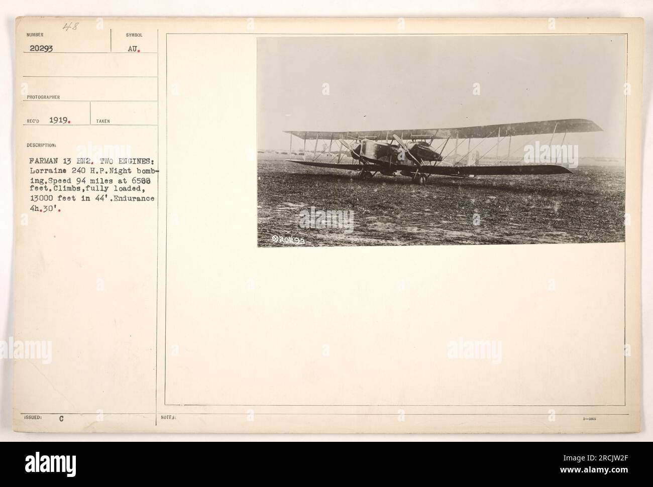 Multiple American military personnel are seen standing together next to ...