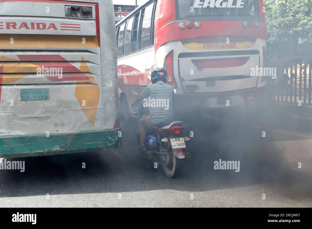 Dhaka, Bangladesh - July 15, 2023: Expired vehicles in Dhaka emit so ...