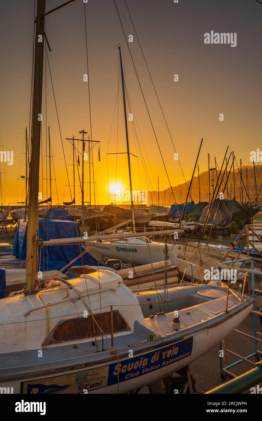 Salerno, Italy - 25th Dec 2022: Sun setting over Port of Salerno Stock ...