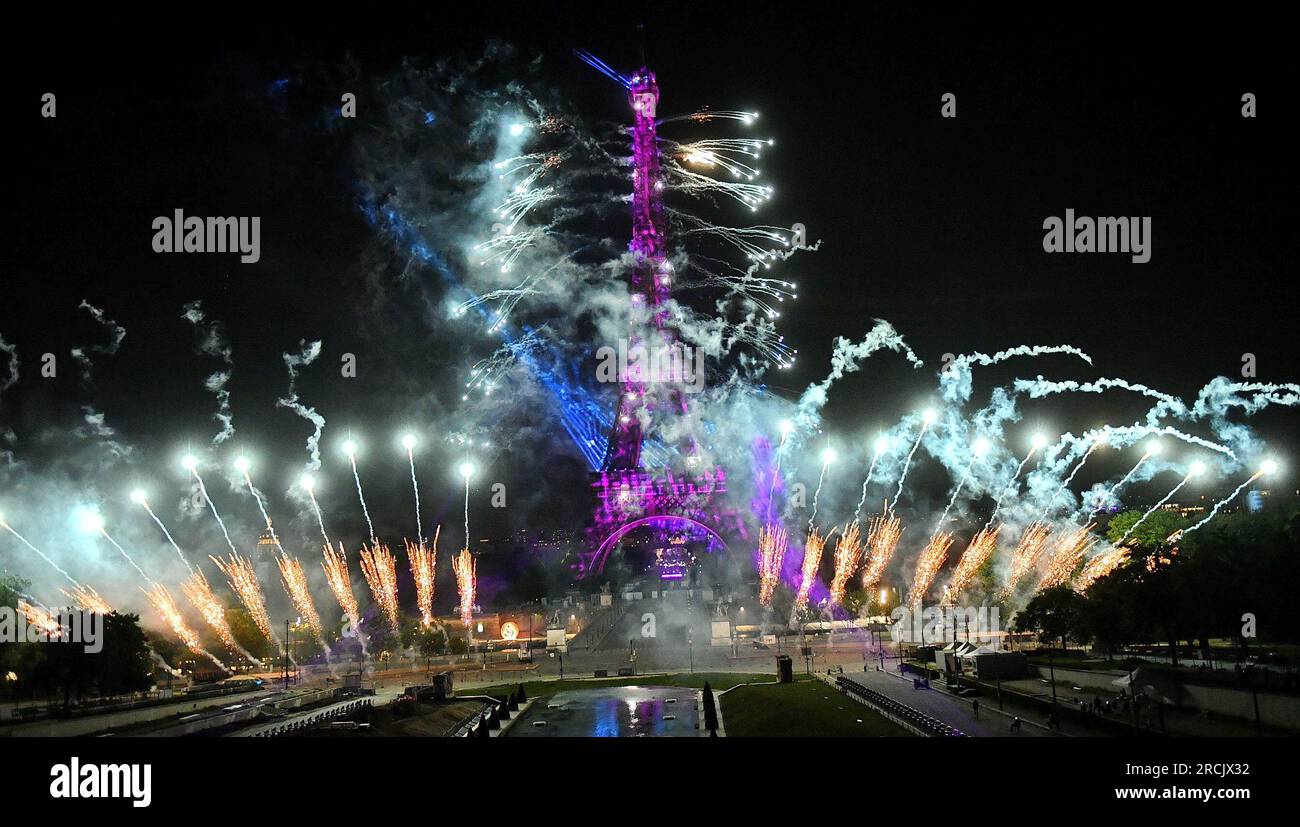 Fireworks light the Eiffel Tower during the Bastille Day celebrations ...