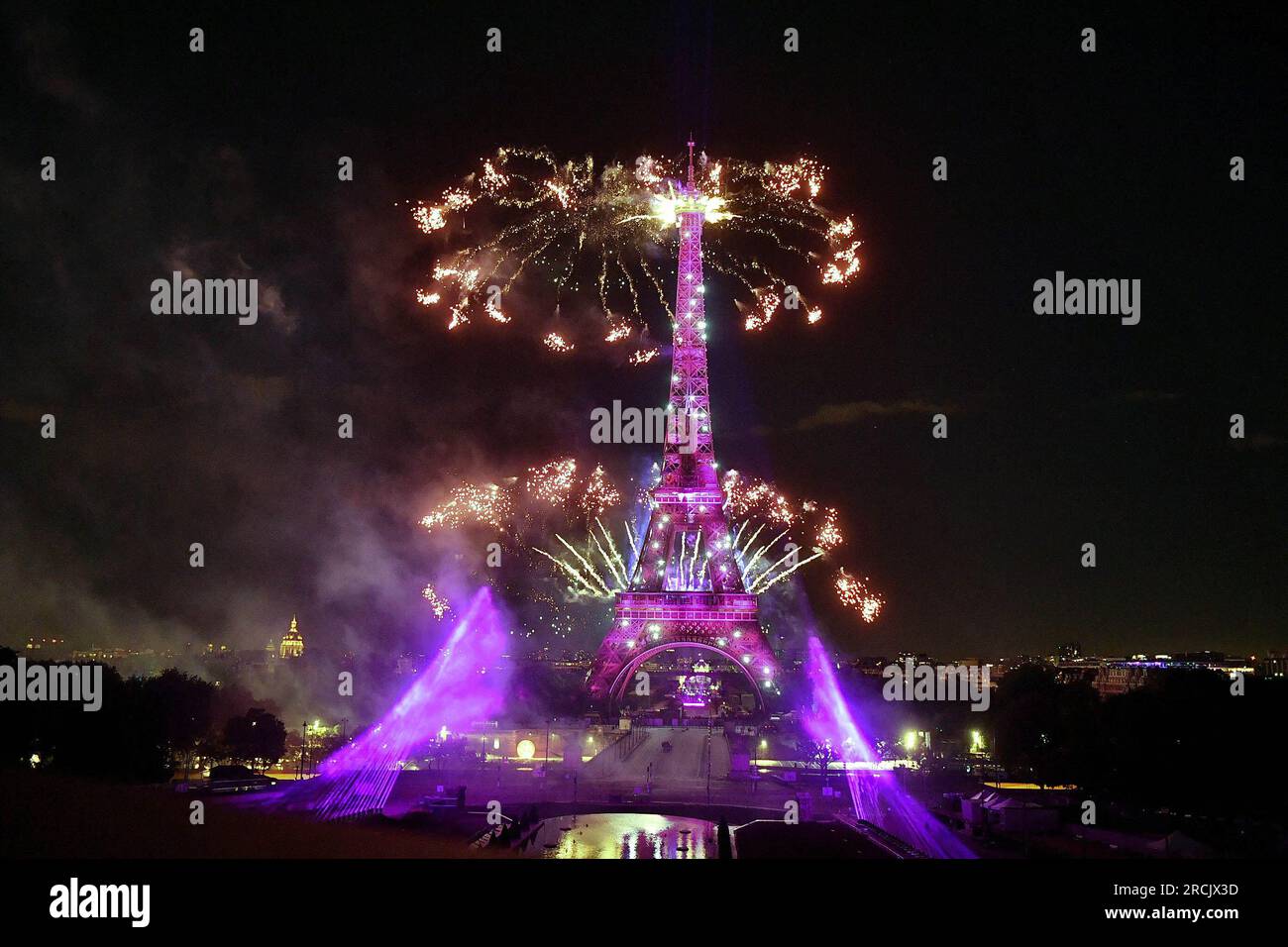 Fireworks light the Eiffel Tower during the Bastille Day celebrations ...