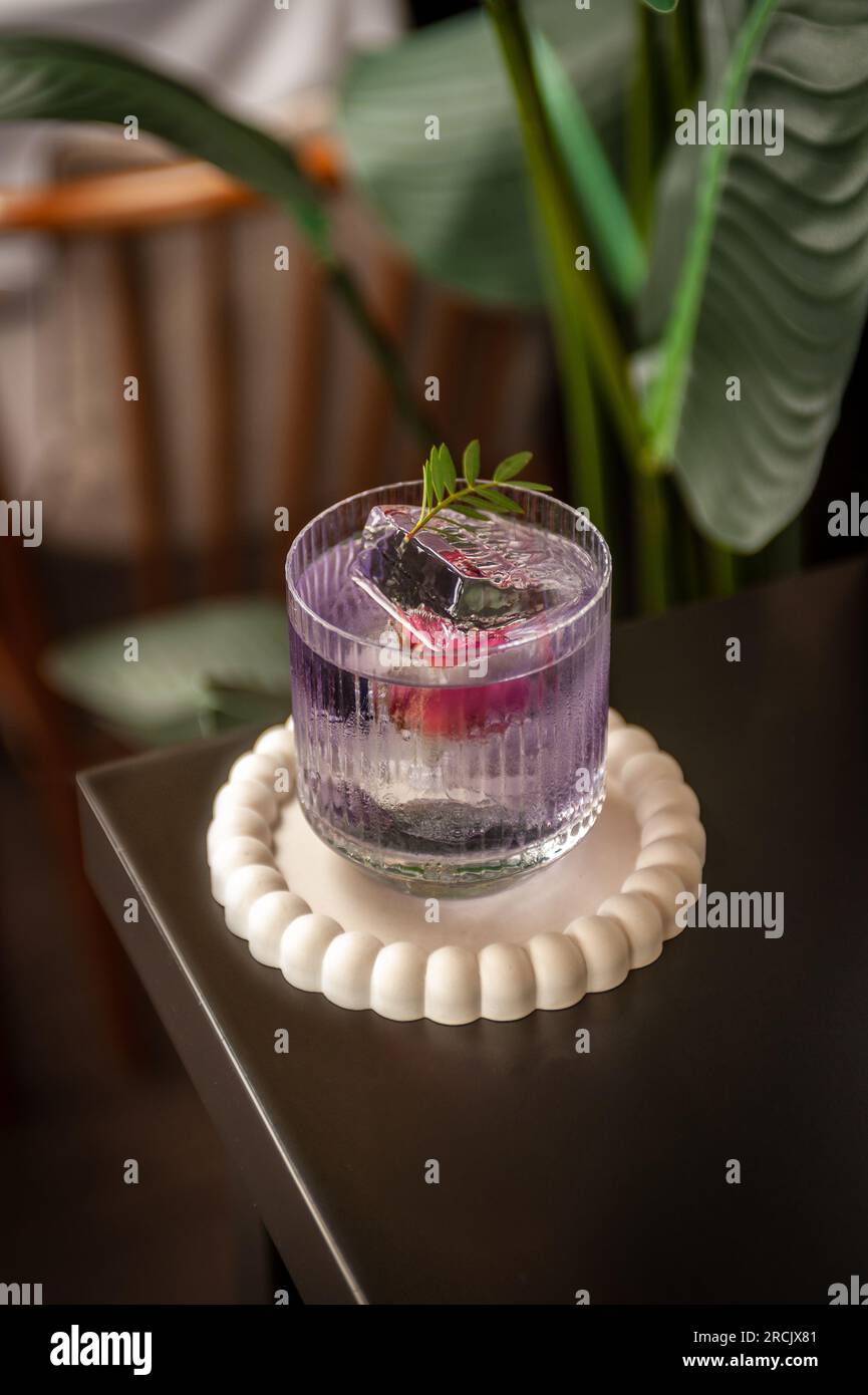 Summer refreshing lemonade drink or alcoholic cocktail with ice. Fresh ...