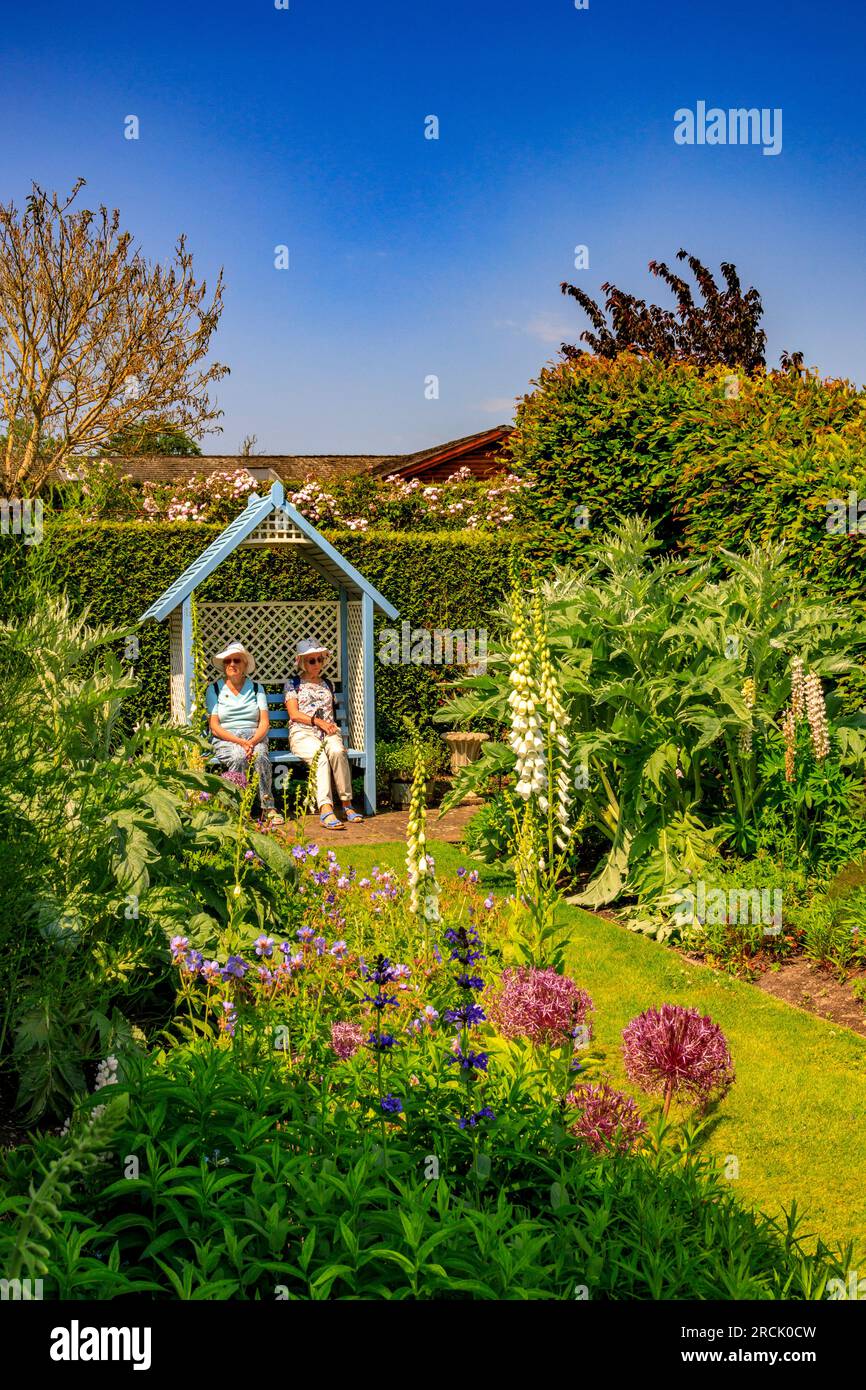 Two lady visitors admiring the attractive palette of blues and pinks in ...