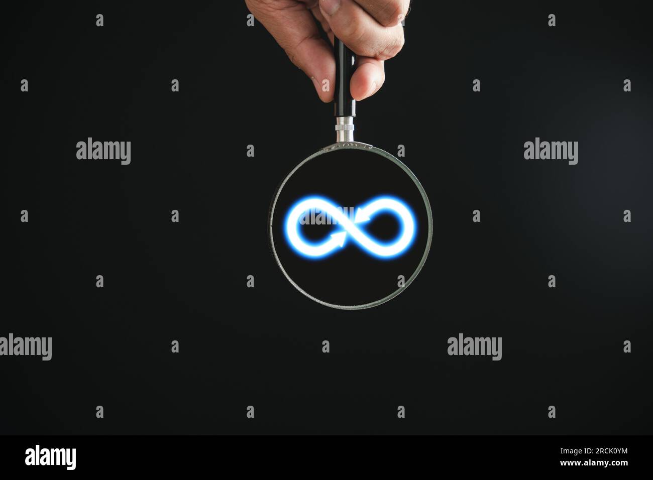 Magnifying glass highlights infinity symbol icons Stock Photo - Alamy Magnifying glass highlights infinity symbol icons Stock Photo - Alamy