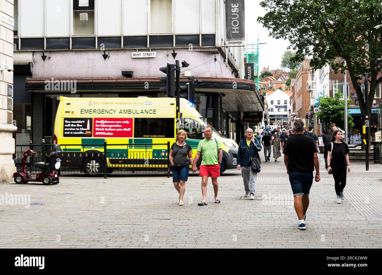 Ambulance on blue light call speeding along Mint Street, Lincoln City ...