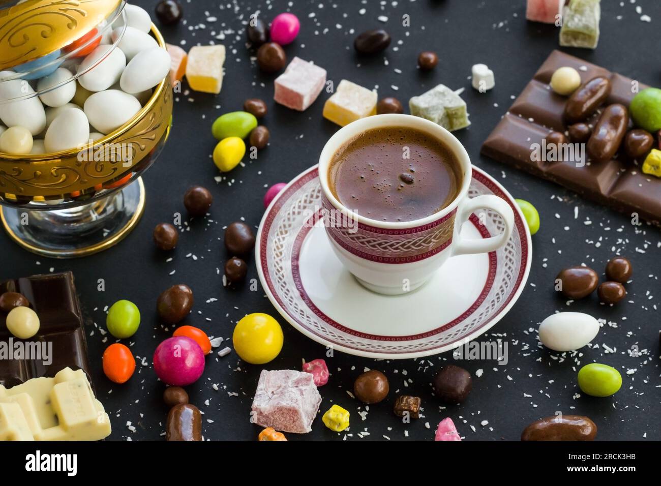 Traditional Turkish Hard Almond Candies designed on black surface with ...