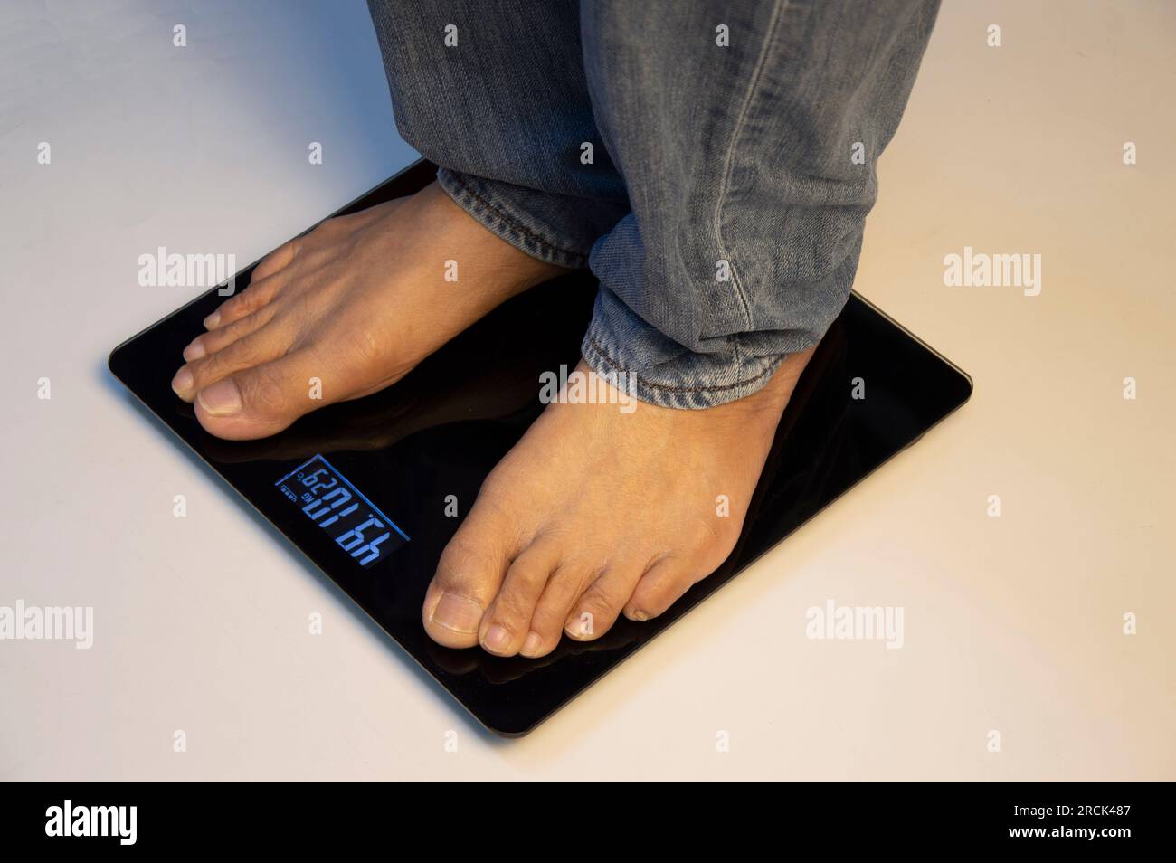 Skinny person scales hi-res stock photography and images - Alamy