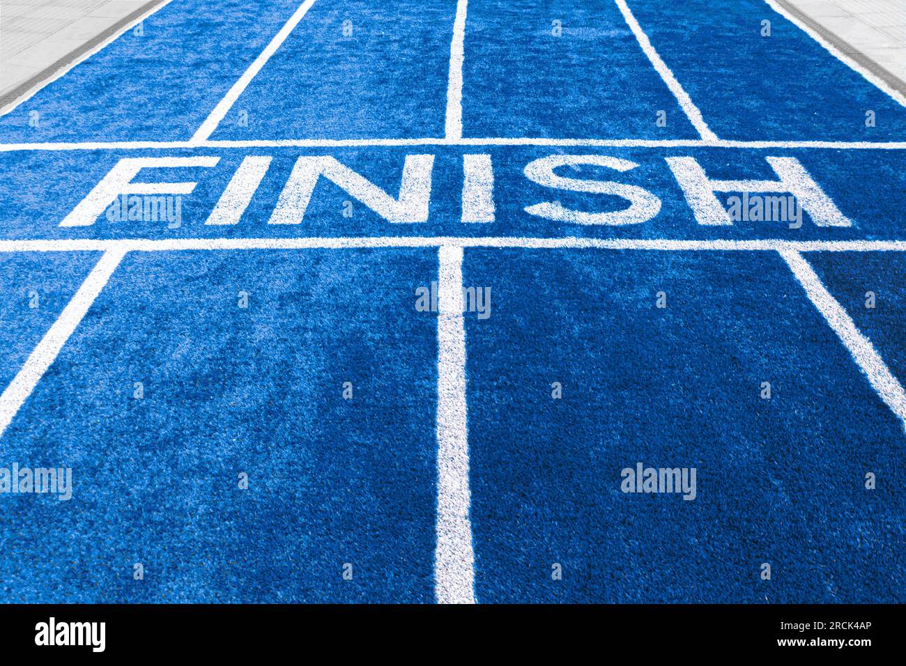 Blue Finish line concept white painted lines on running track Stock ...