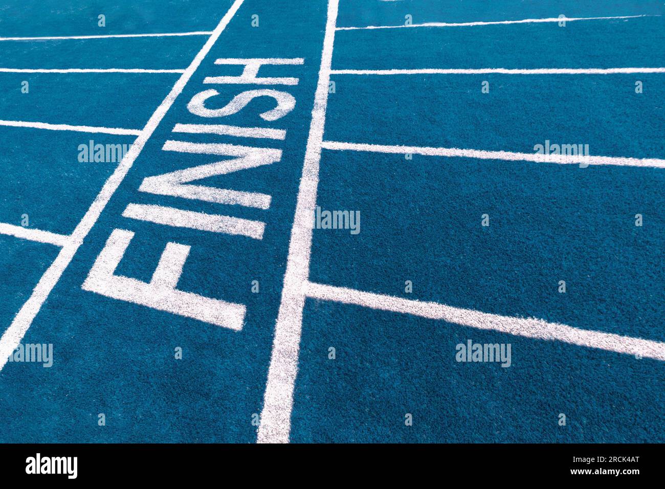Blue Finish line concept white painted lines on running track Stock ...