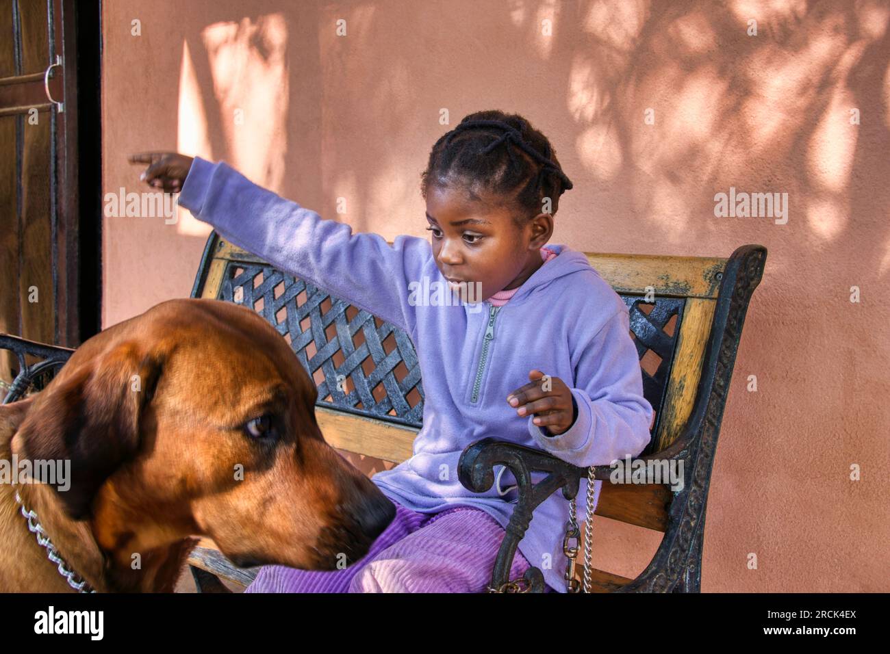 Childhood cheeky facial expression hi-res stock photography and images ...