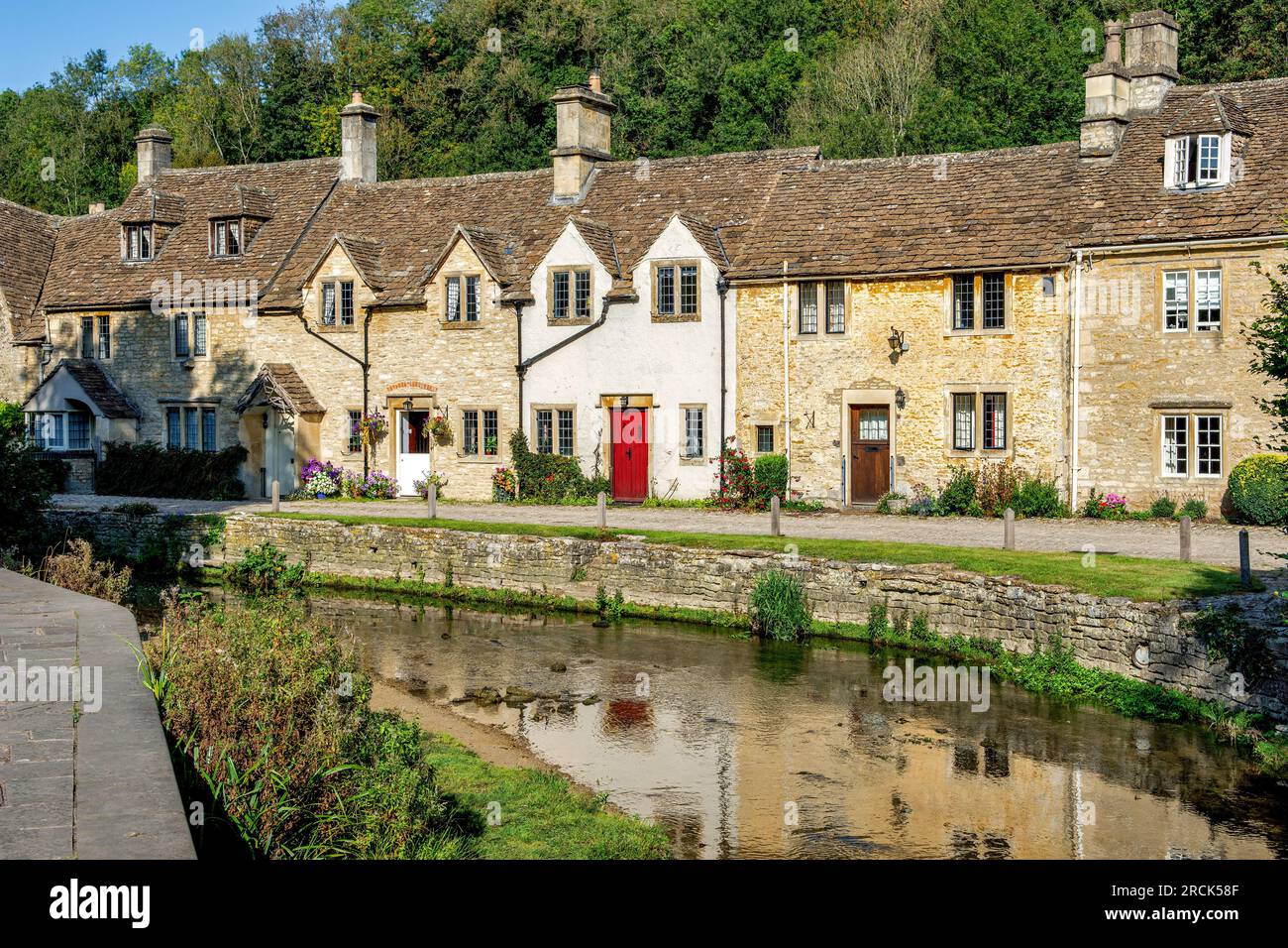 The picturesque village of Castle Combe in the Cotswolds, England in ...