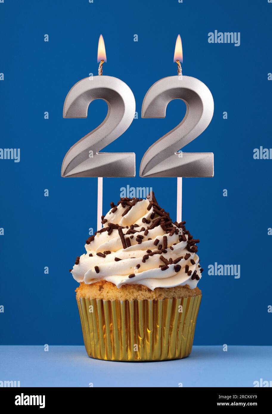 Horizontal Birthday Card With Cake Lit Candle Number 22 On Blue