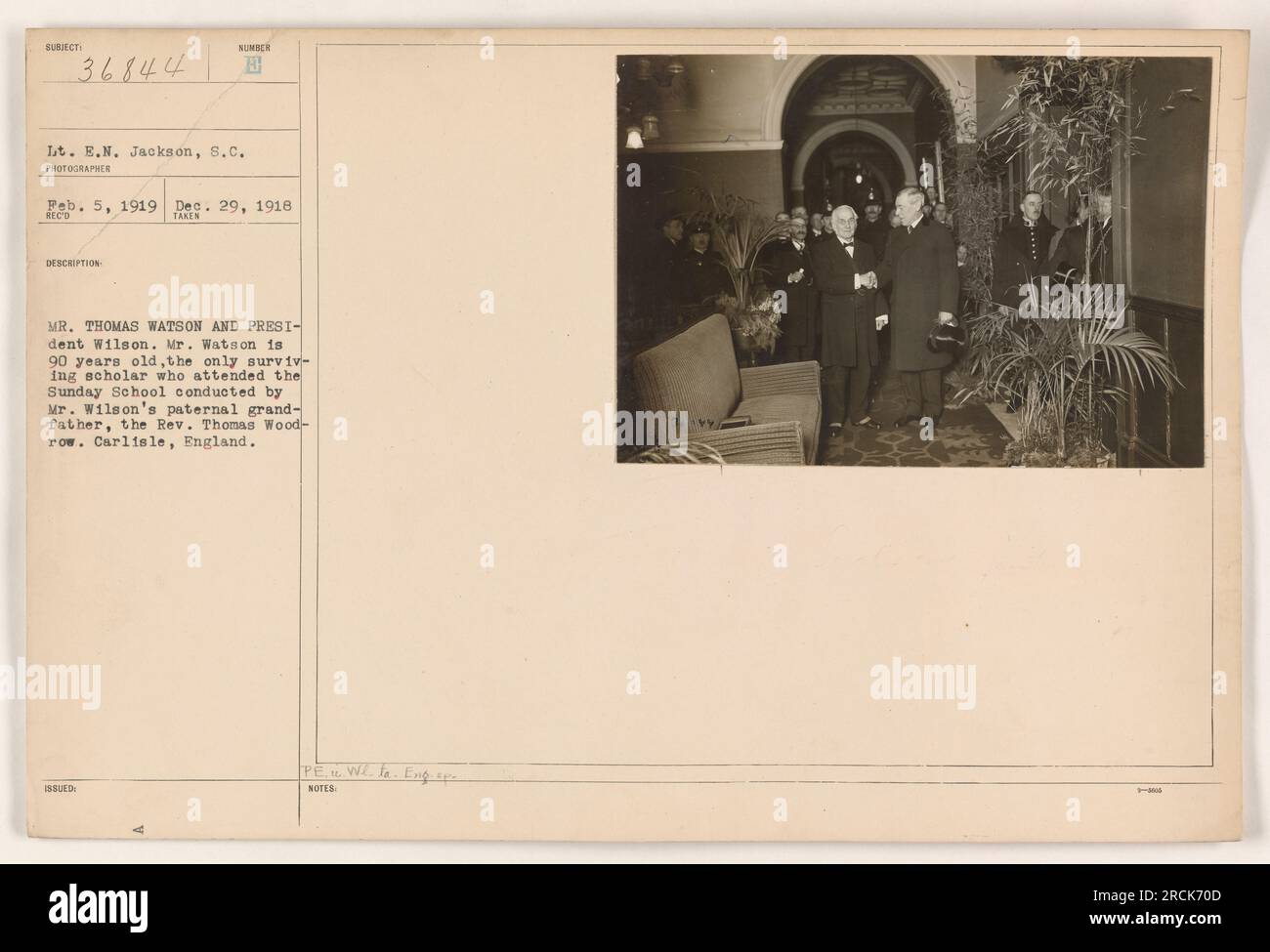 Caption: Lt. E.N. Jackson, S.C., photographed with Mr. Thomas Watson ...