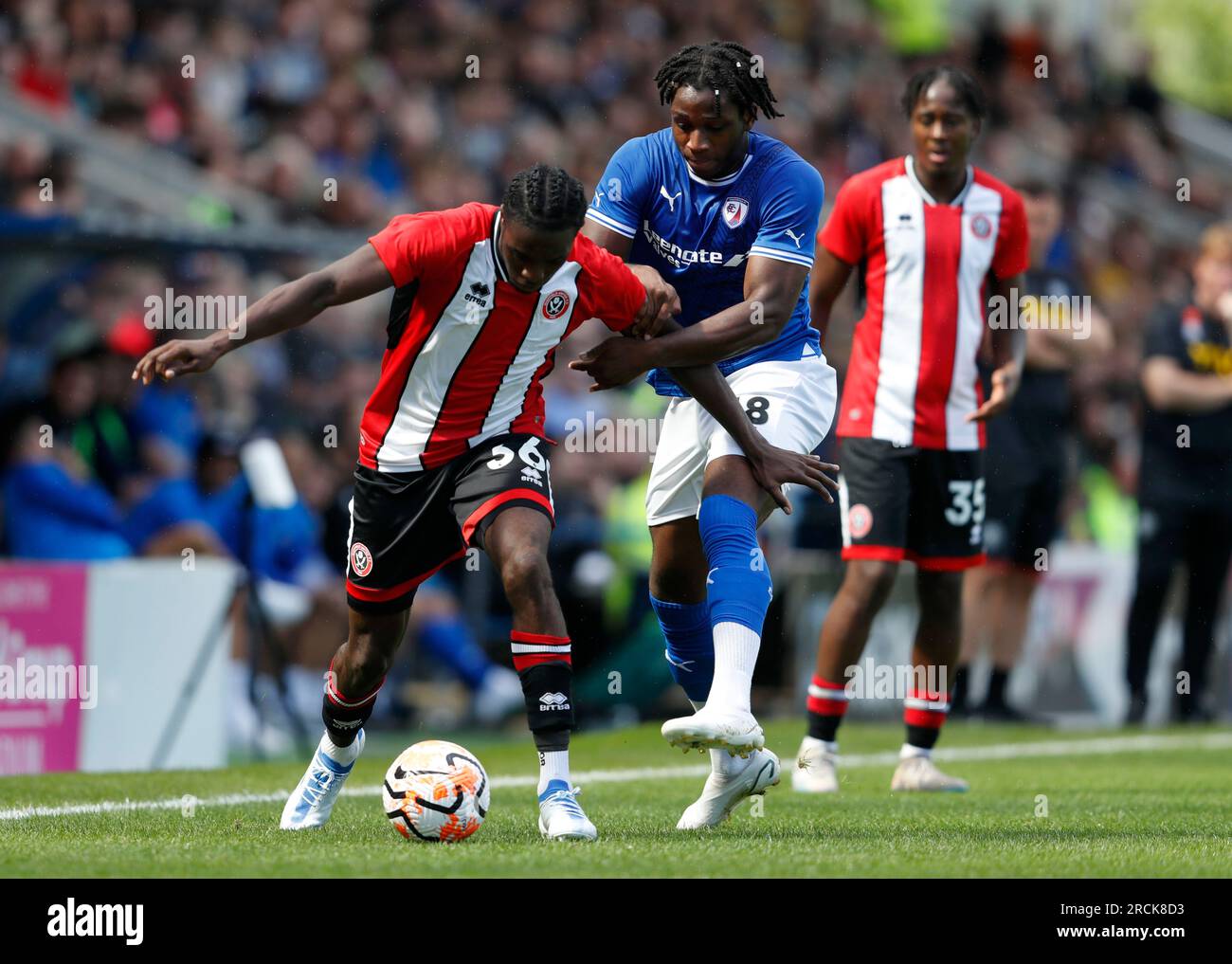 Sheffield United's Femi Seriki (left) and Chesterfield's Jesurun ...