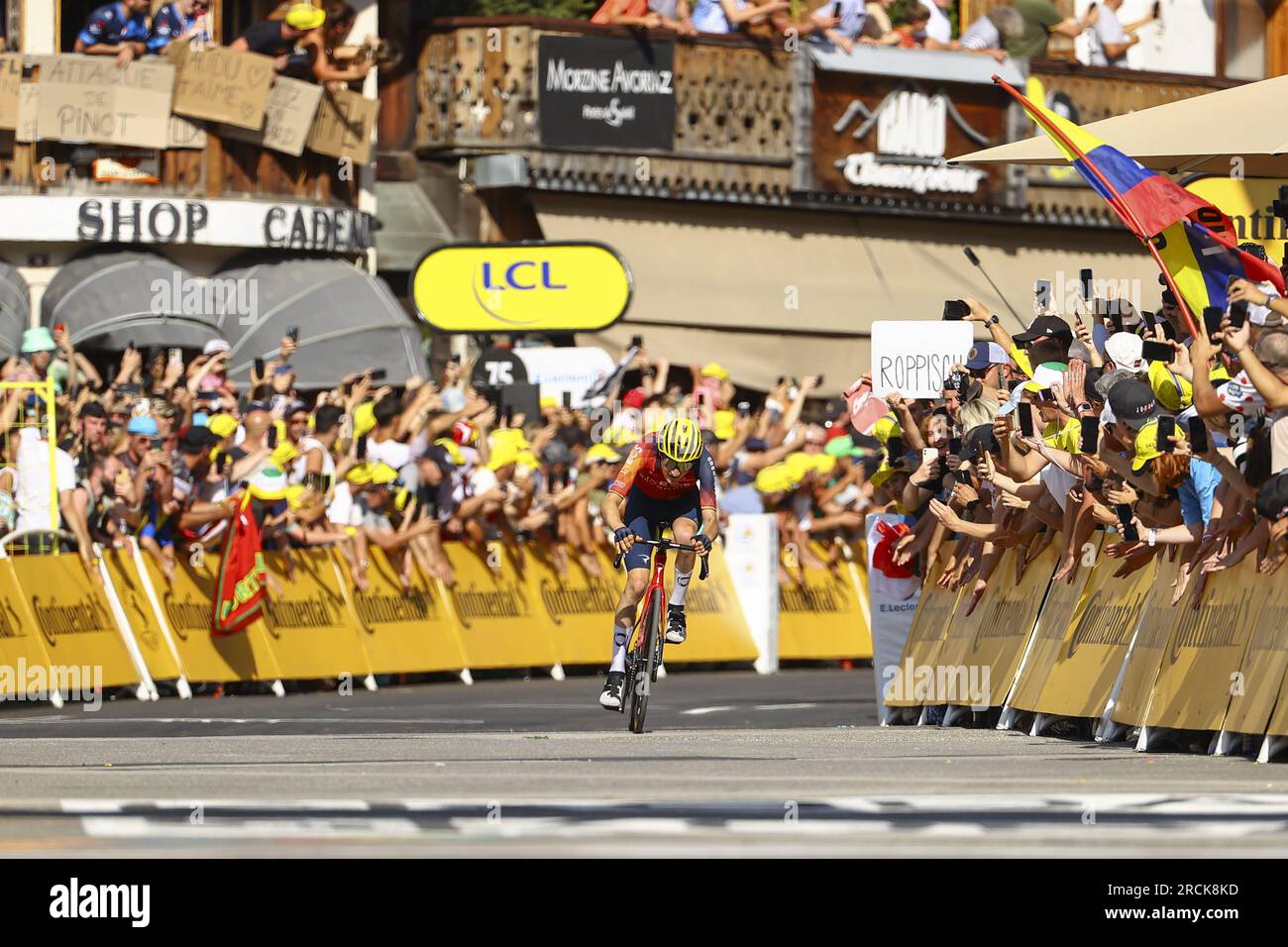 Spanish Carlos Rodriguez of Ineos Grenadiers crosses the finish line to ...