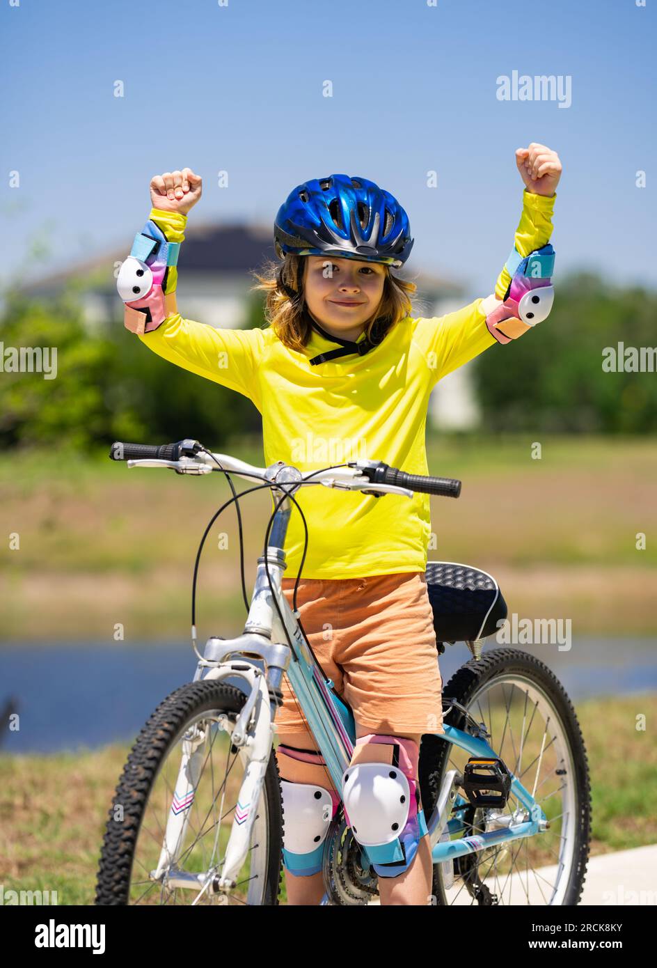 Little kid boy ride a bicycle in the park. Kid cycling on bicycle ...
