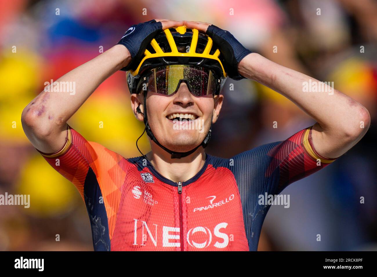 Spain's Carlos Rodriguez crosses the finish line to win the fourteenth ...