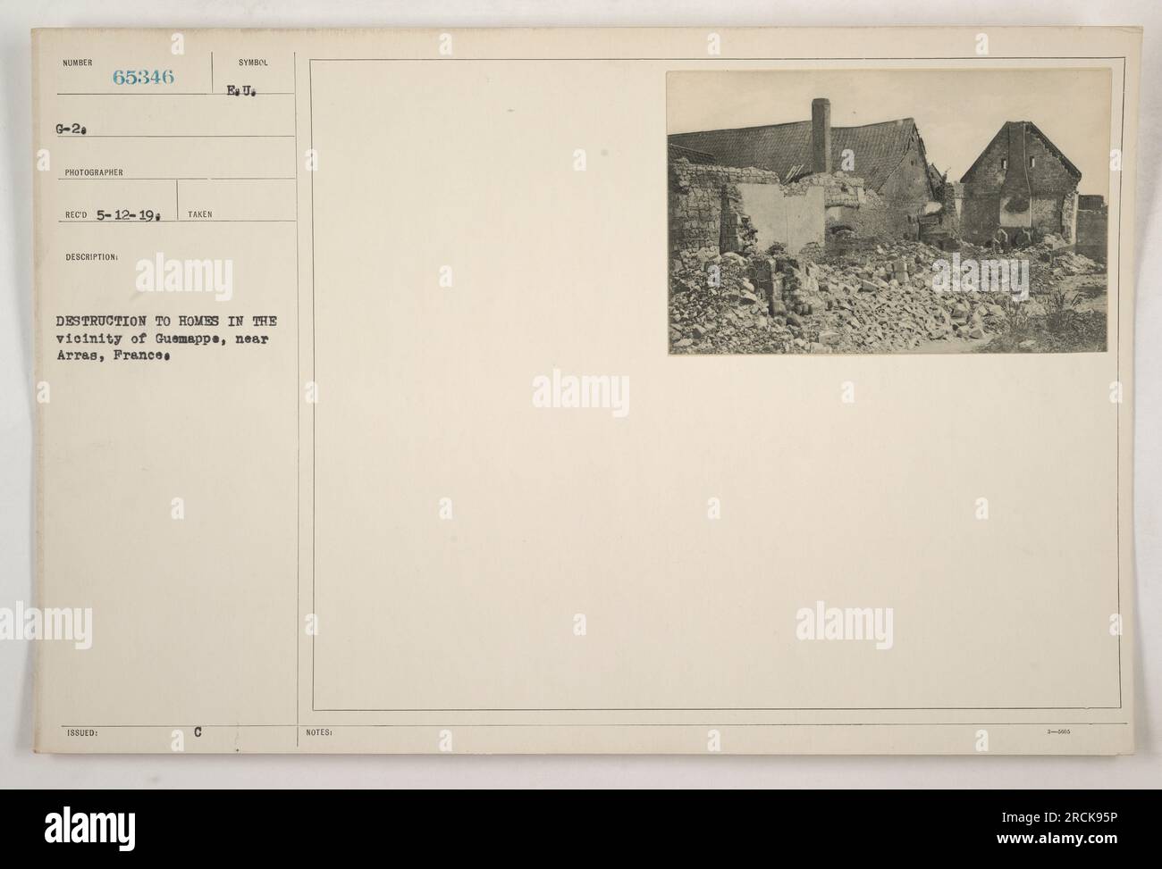 The photograph shows the aftermath of the destruction of homes near ...