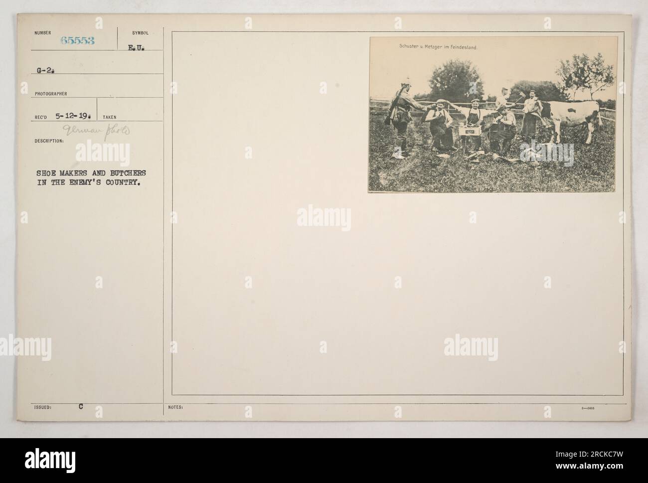 German craftsmen, believed to be shoe makers and butchers, seen working ...