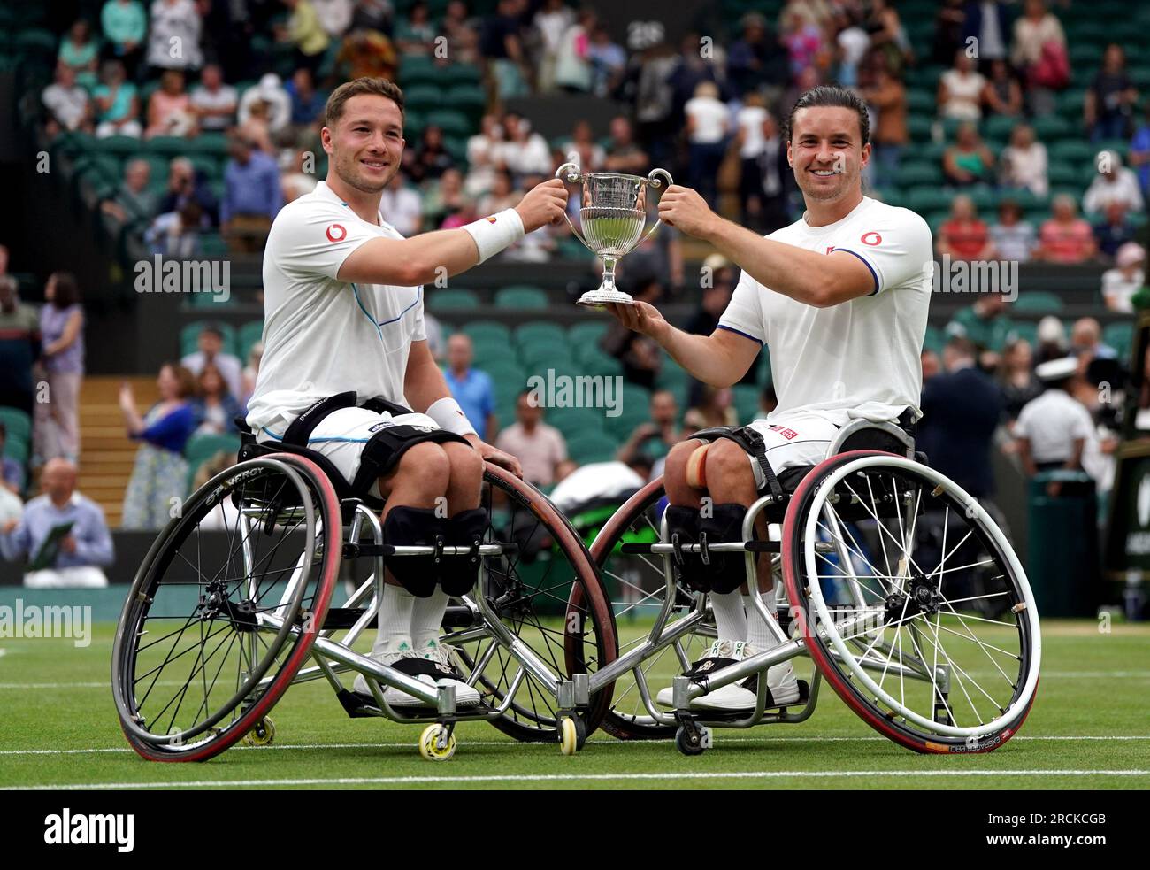 Alfie Hewett and Gordon Reid celebrate with the trophy following their ...