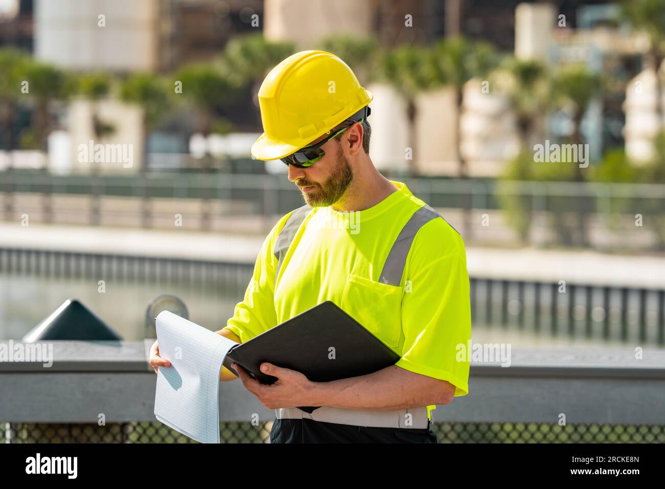 Construction builder in building uniform on buildings construction ...