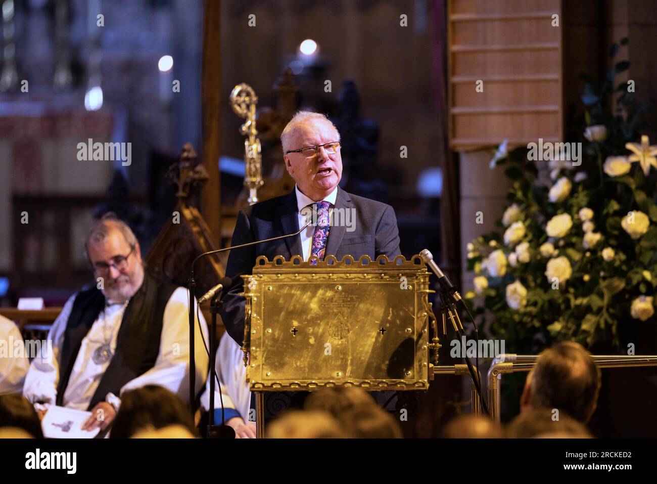 MSP, Alex Neil, reads the second eulogy, during a memorial service at ...