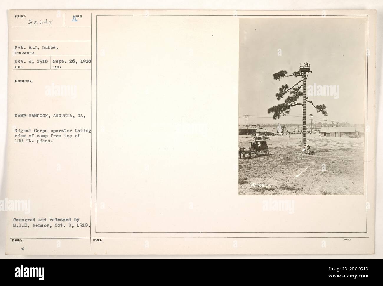 Title: Signal Corps Operator Capturing Camp Hancock from Towering Pines ...